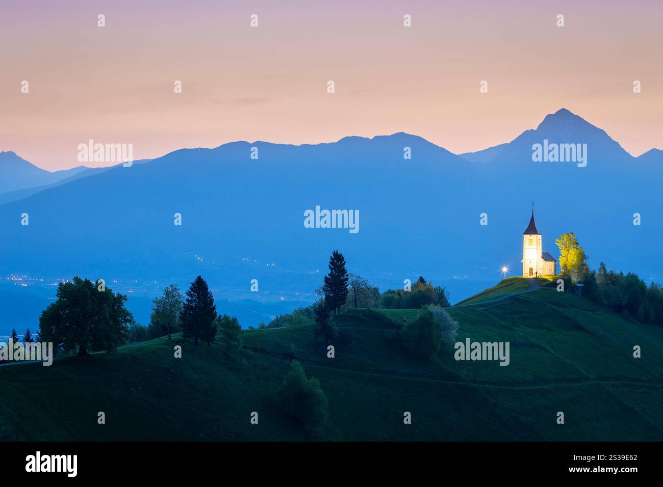 The iconic Jamik church, with Mount Triglav on the background ...