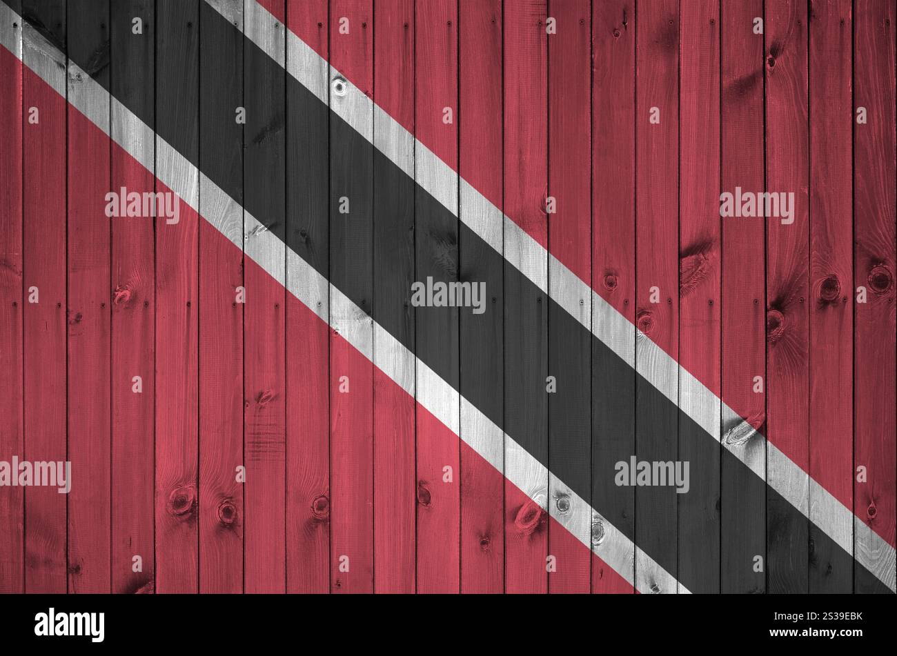 Trinidad and Tobago flag depicted in bright paint colors on old wooden ...