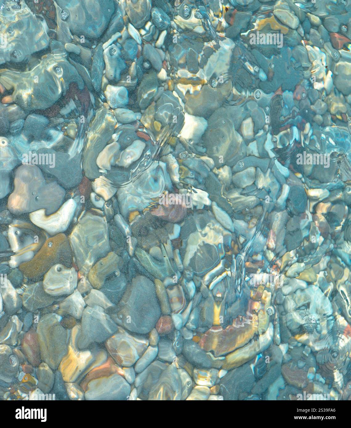 Rocks in a shallow pond background . Rocks in a shallow pond Stock ...