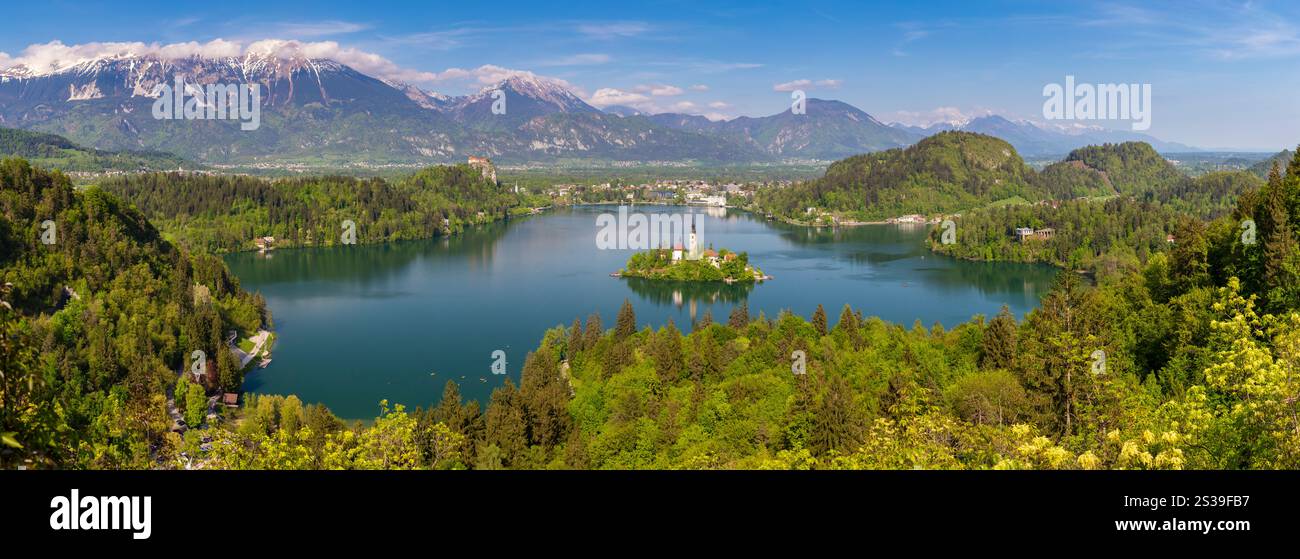 View of lake Bled at in spring with the small island and Assumption of ...
