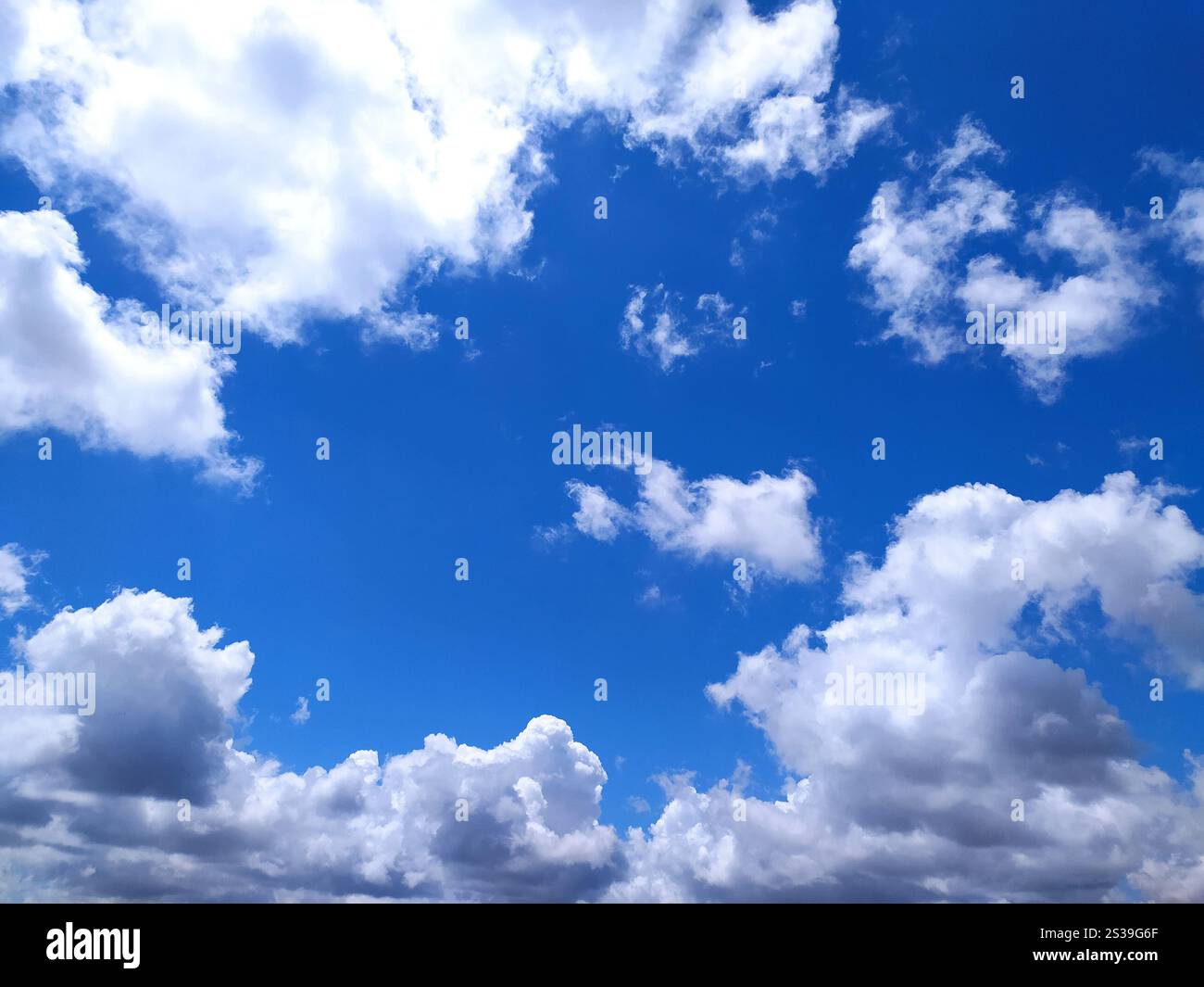 Clear blue sky texture and white fluffy cloud nature background. The ...
