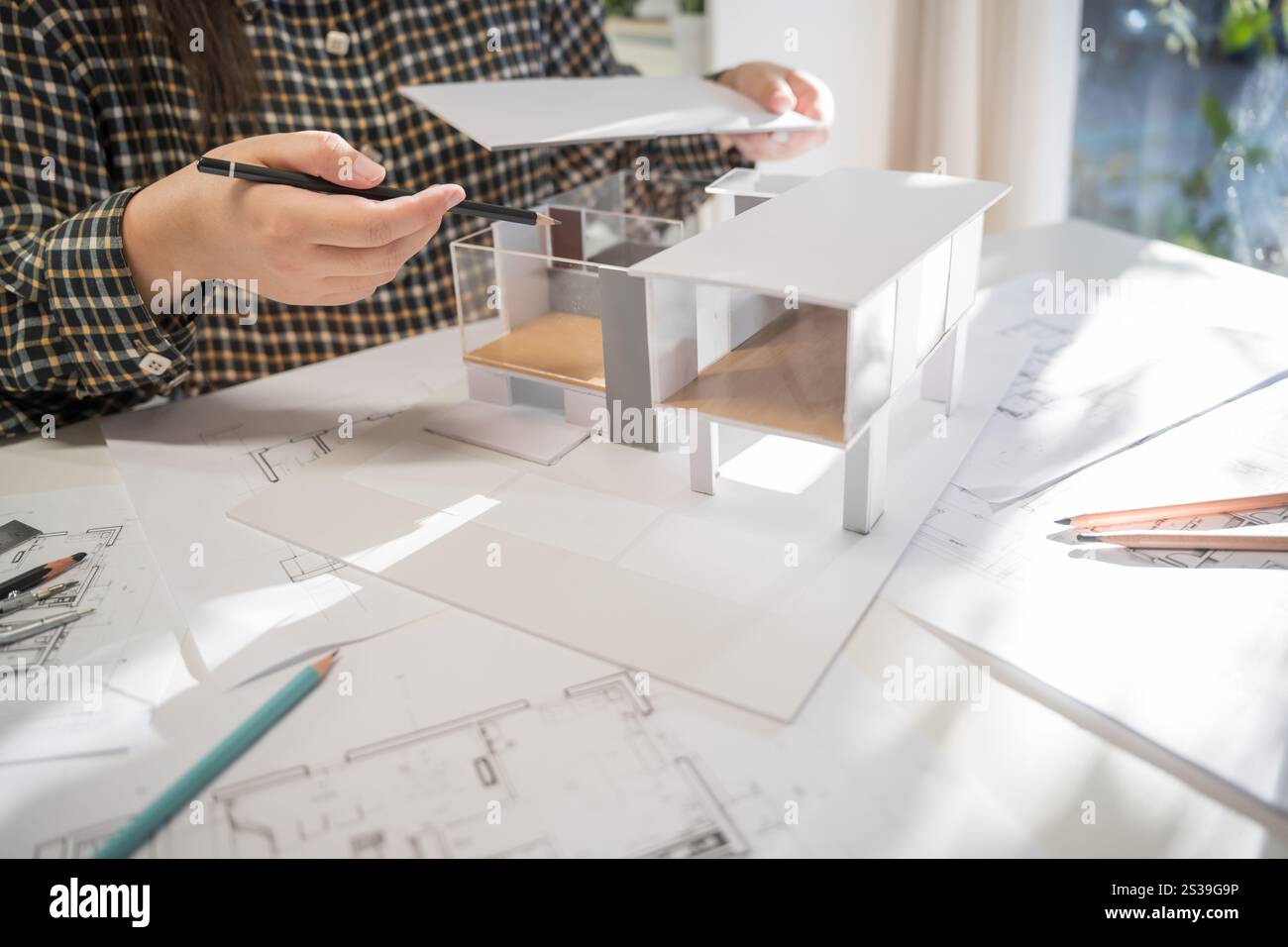 House model on Buleprint construction drawing and drawing equipment ...
