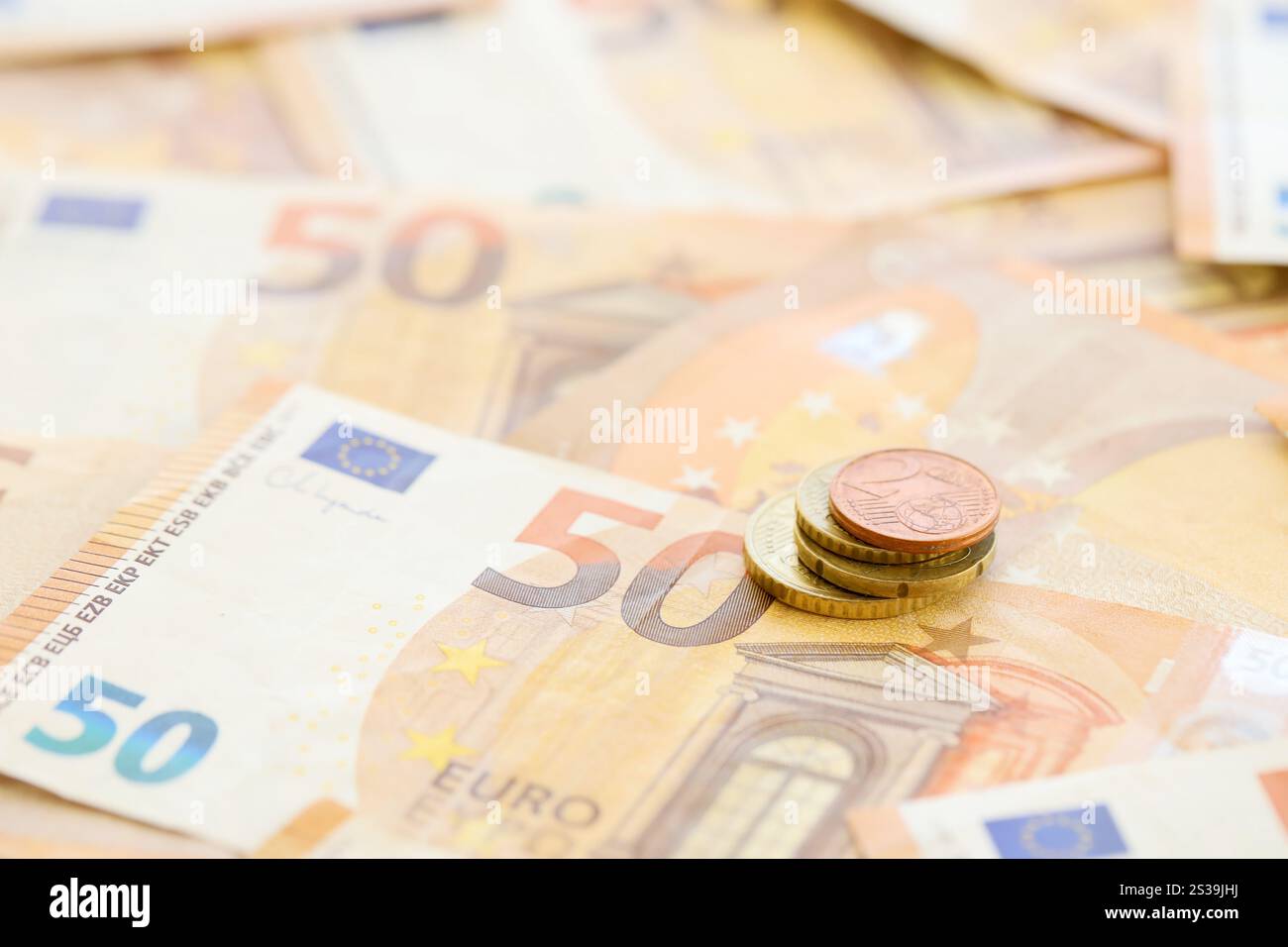 Very big amount of fifty european euro banknotes in huge pile close up ...