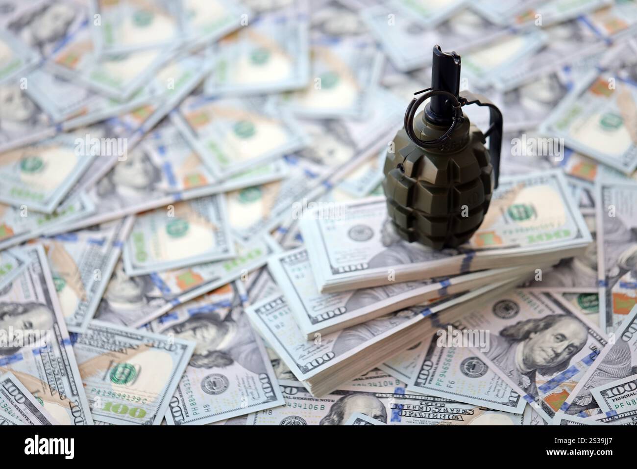 Grenade with a check against the background of huge amount of american ...