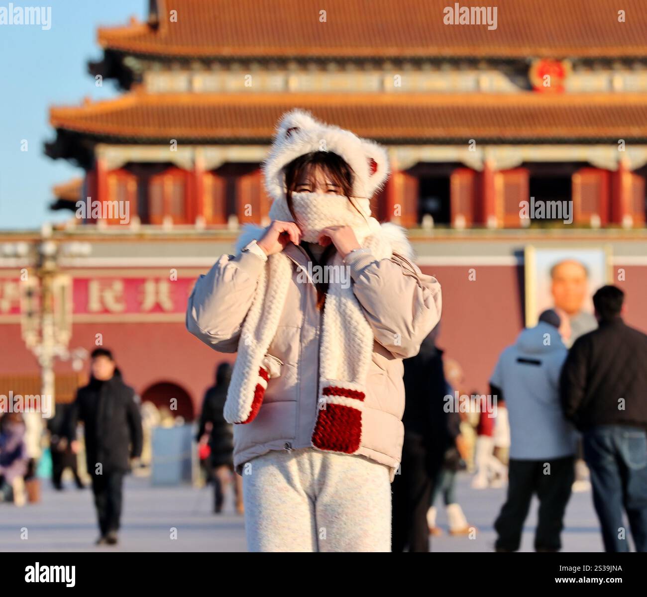 Tourists visit Tiananmen Square amid cold ari in Beijing, China, 7 ...