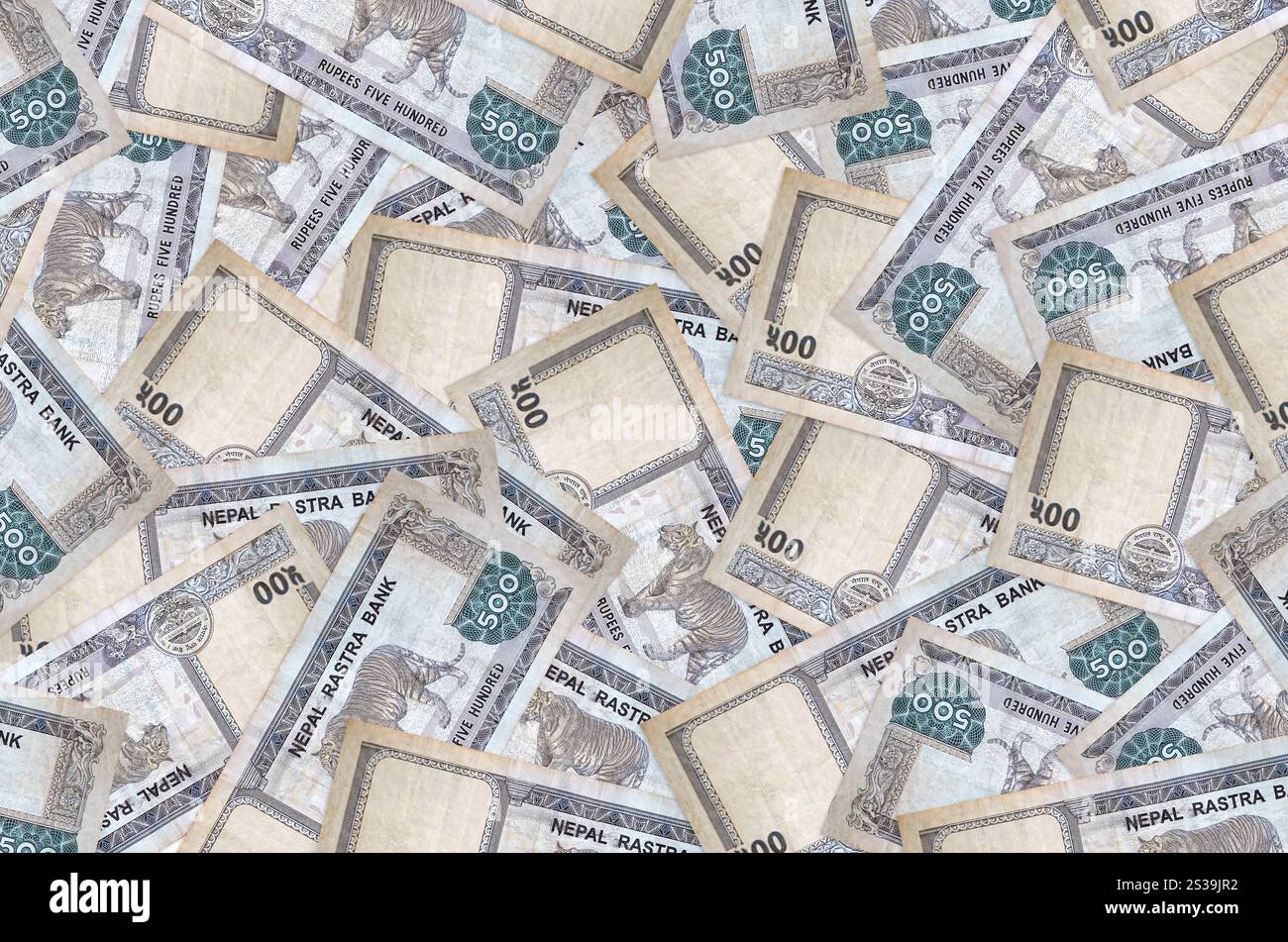 500 Nepalese rupees bills lies in big pile. Rich life conceptual ...