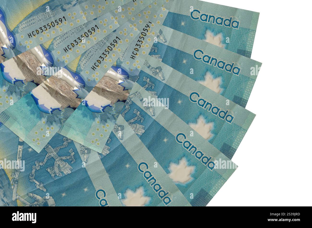 5 Canadian dollars bills lies isolated on white background with copy ...