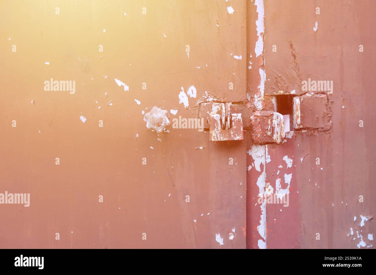 Closed metal lock garage door security protection padlock. Old brown ...