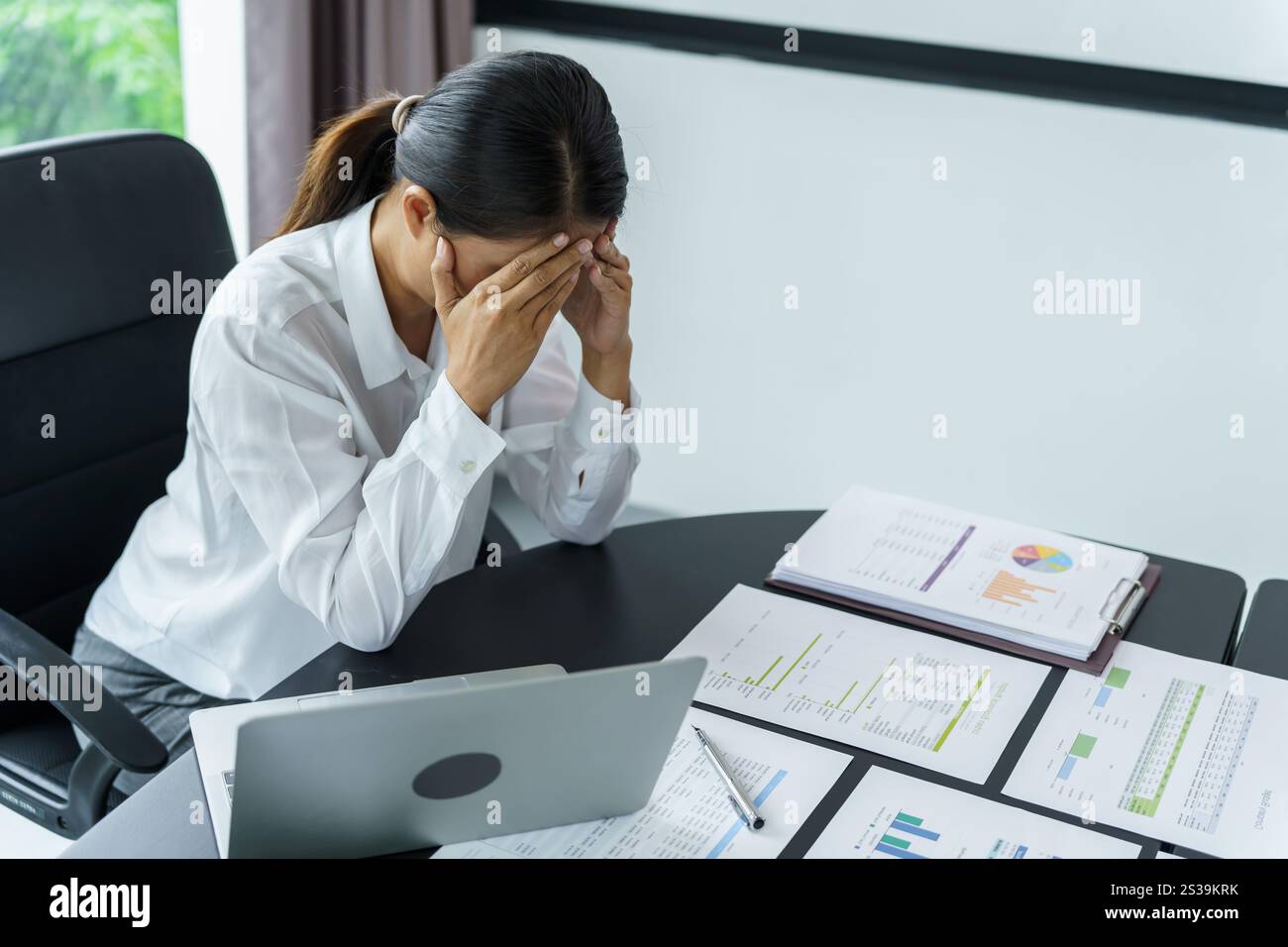 Burnout concept. Asian Business woman touching forehead having headache ...