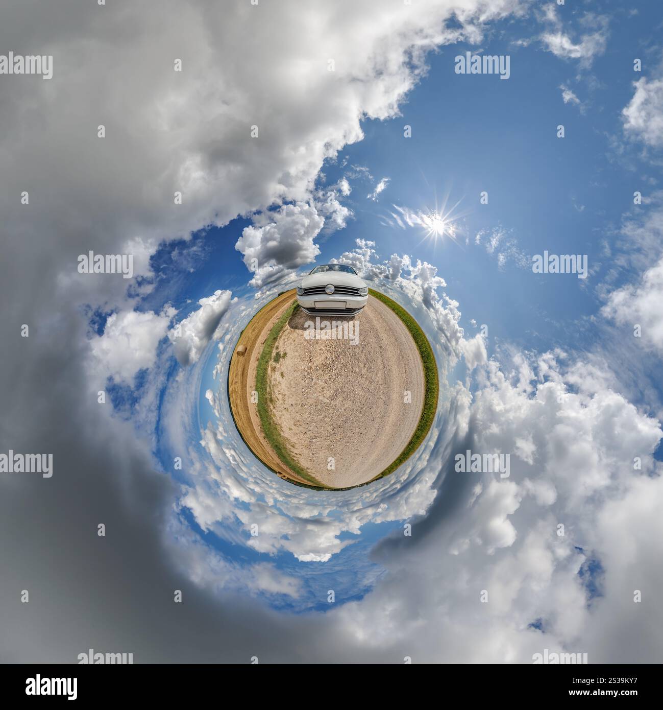 simple little tiny planet with white car on road in blue sky with sun ...