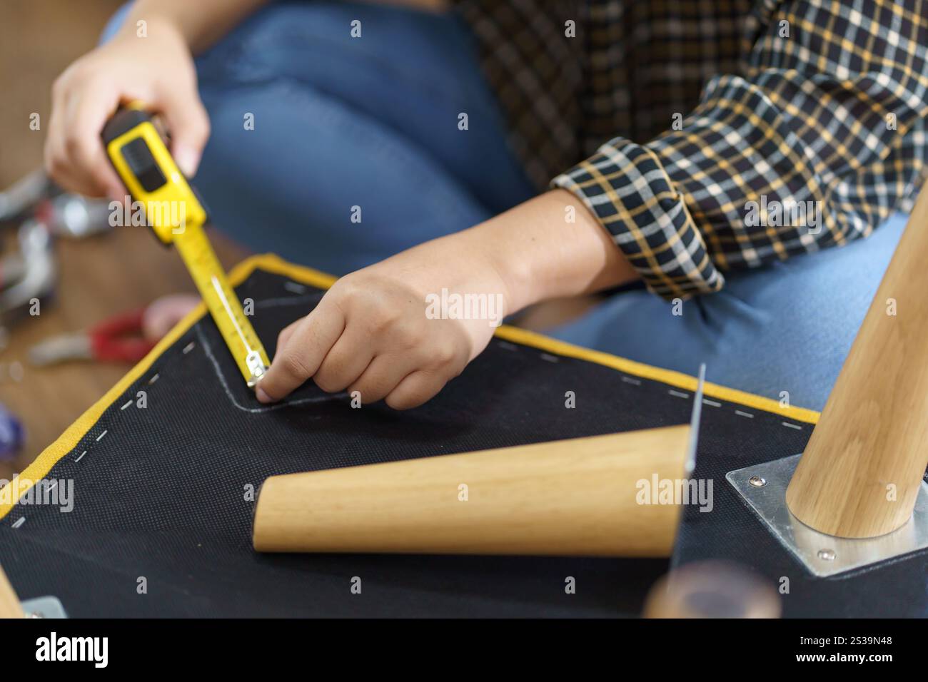 Asian Woman self repairs furniture renovation using equipment to diy ...