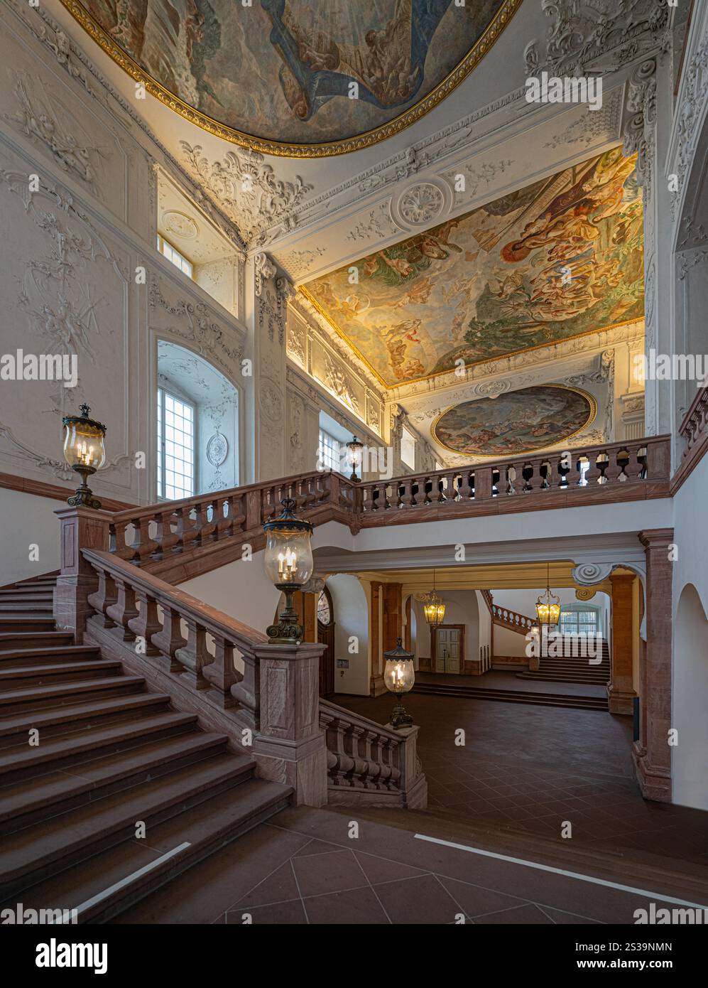 Magnificent staircase with impressive intricate stucco paintings and ...
