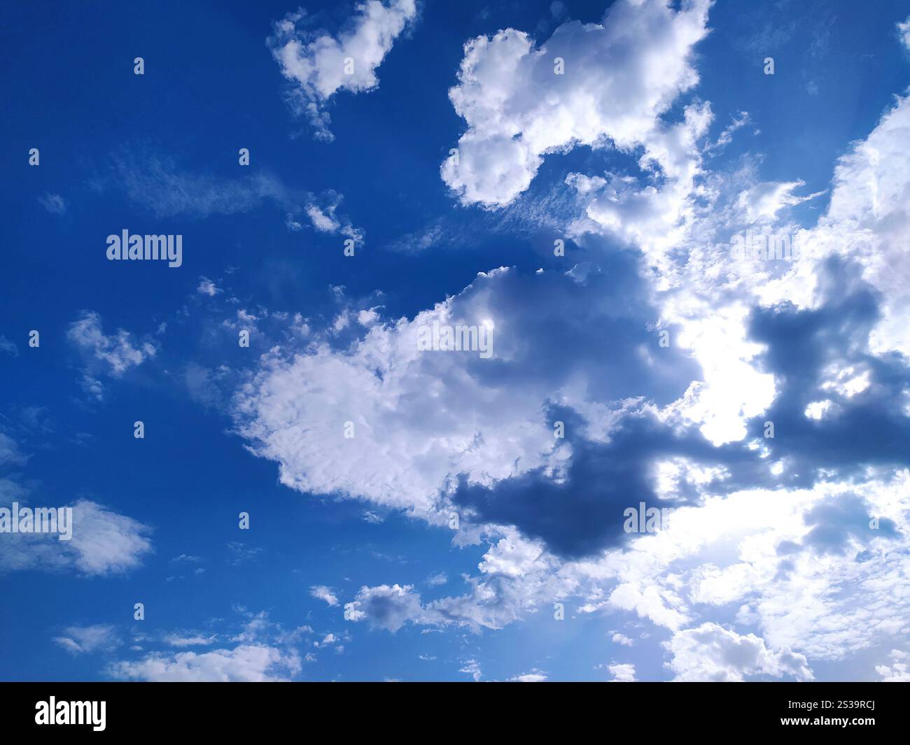 Clear blue sky texture and white fluffy cloud nature background. The ...