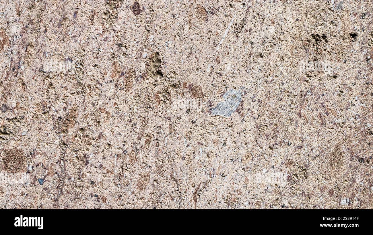 panoramic textured background - surface of brown armenian tuff wall ...