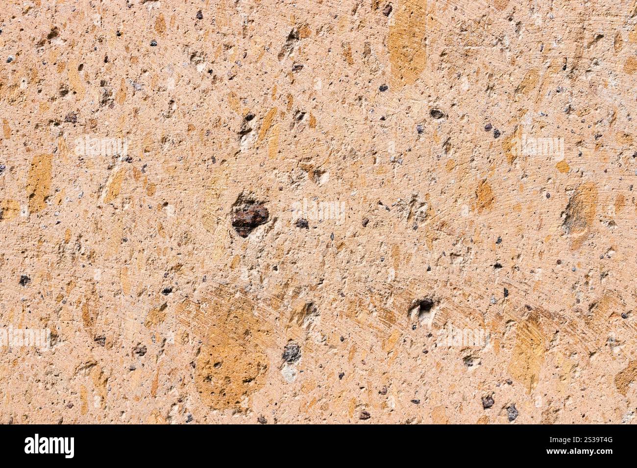 textured background - surface of yellow armenian tuff wall tile Stock ...