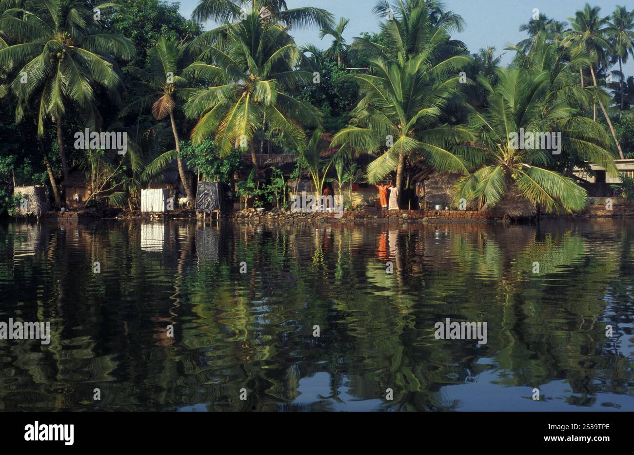 People at a village on a Canal in the Lagoons and Backwater at the ...
