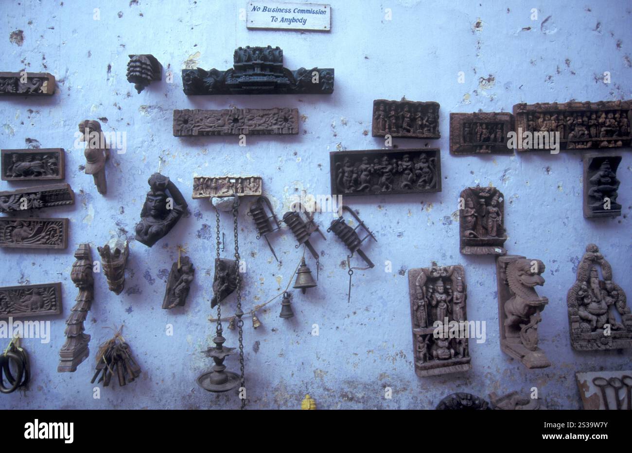 a shop with wood carving souvenirs in the city of Kochi or Cochin in ...