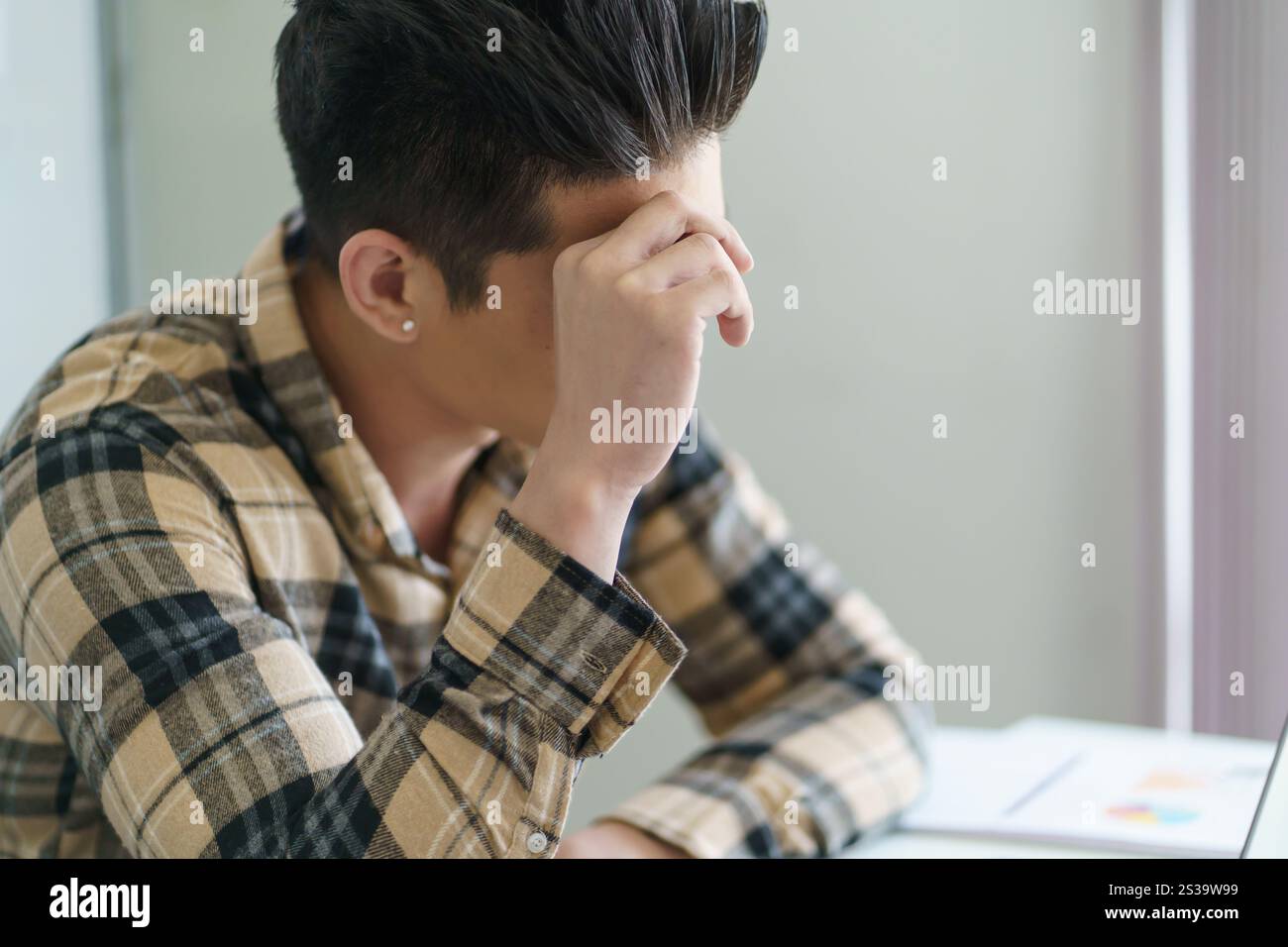 Burnout concept. Asian Business man touching forehead having headache ...