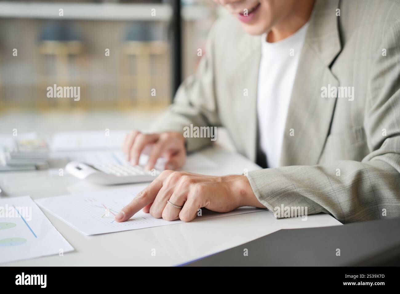 Happy asian man employee counting hi-res stock photography and images ...