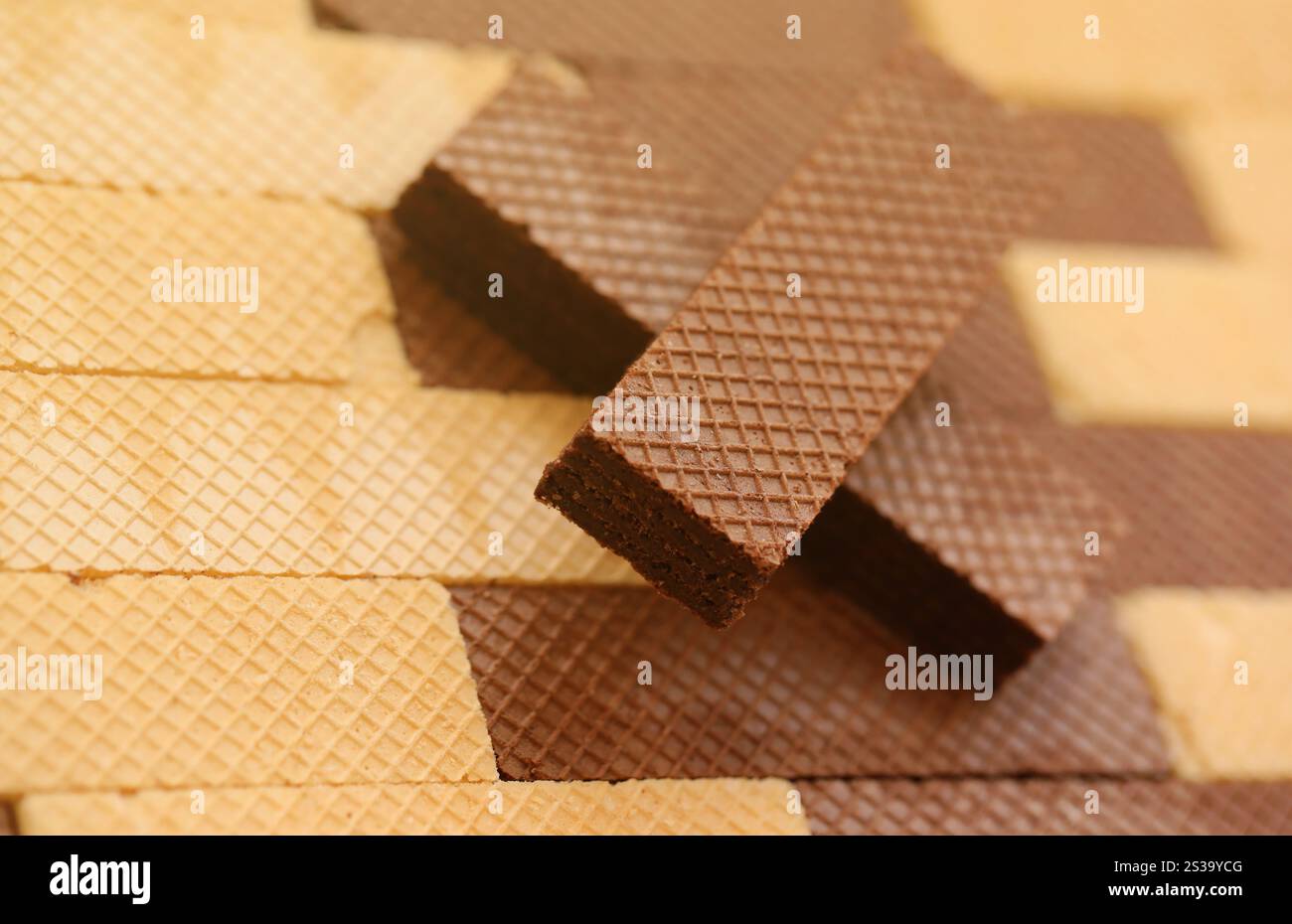 Stacked delicious chocolate wafers in large amount. Two different ...