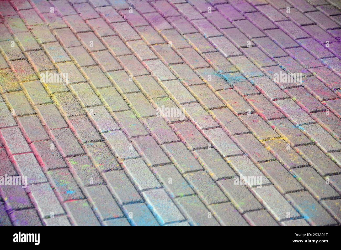 Multi colored earth, paving slabs, powder coated with dry colors at the ...