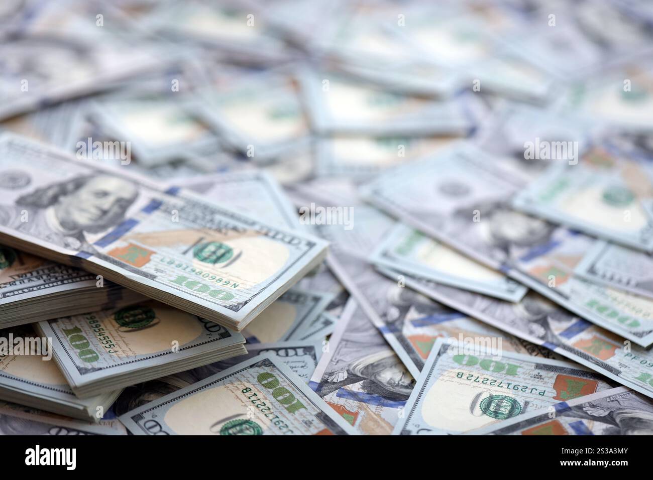 Very big amount of US hundred dollar bills close up. Huge quantity of ...