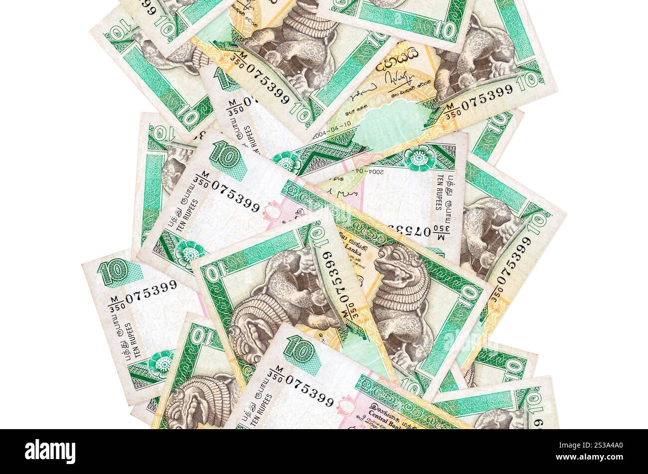 10 Sri Lankan rupees bills flying down isolated on white. Many ...