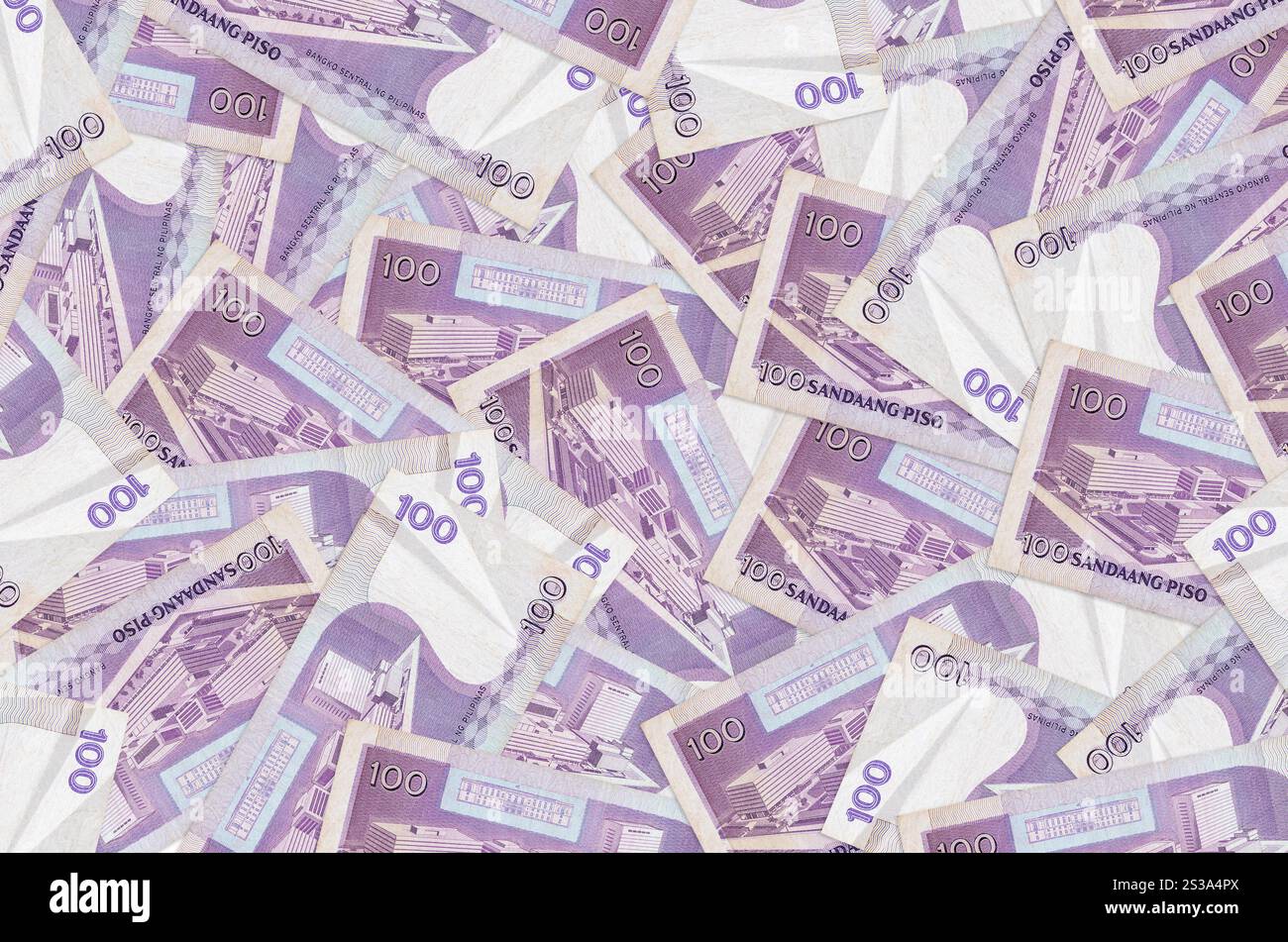 100 Philippine piso bills lies in big pile. Rich life conceptual ...