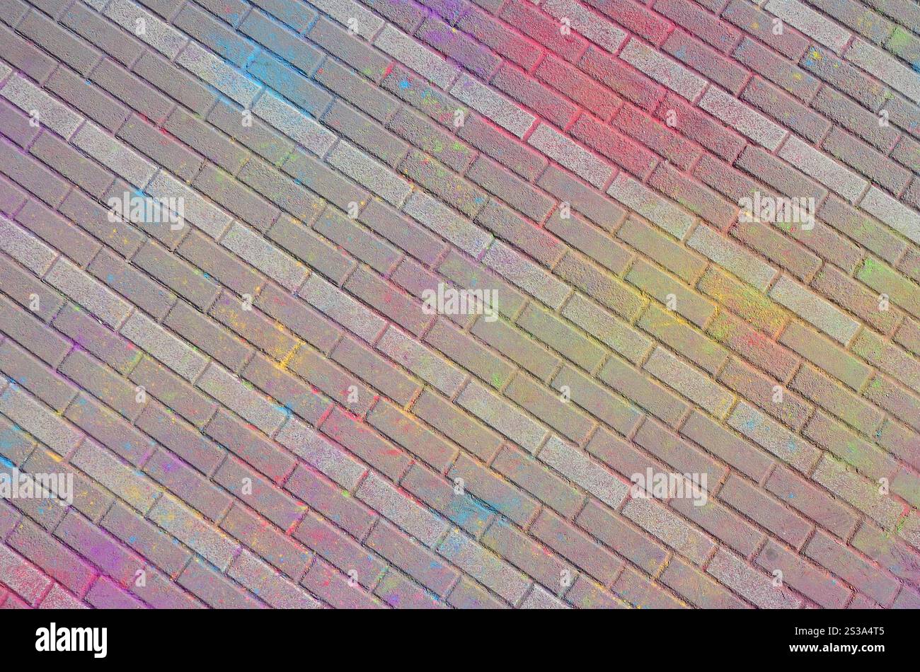 Multi colored earth, paving slabs, powder coated with dry colors at the ...