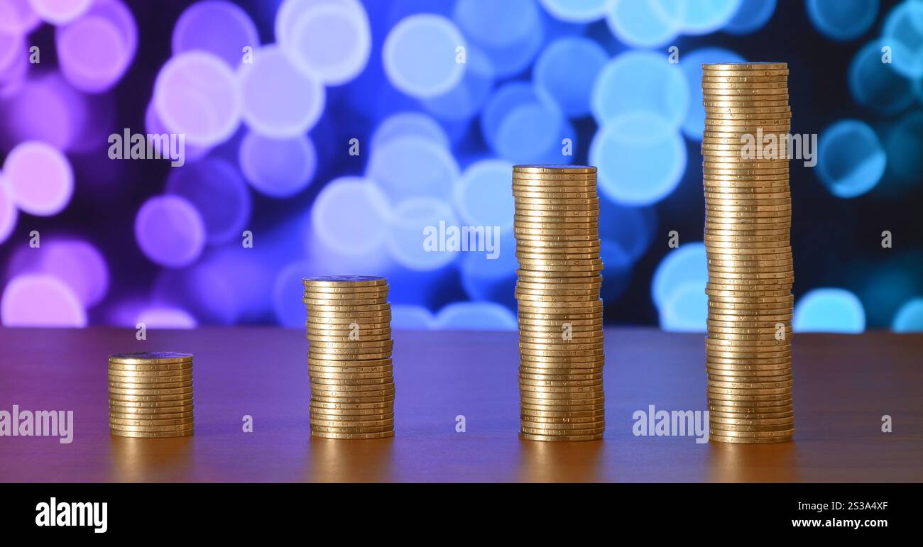 Golden coin stacks arranged as a graph. Increasing columns of coins ...