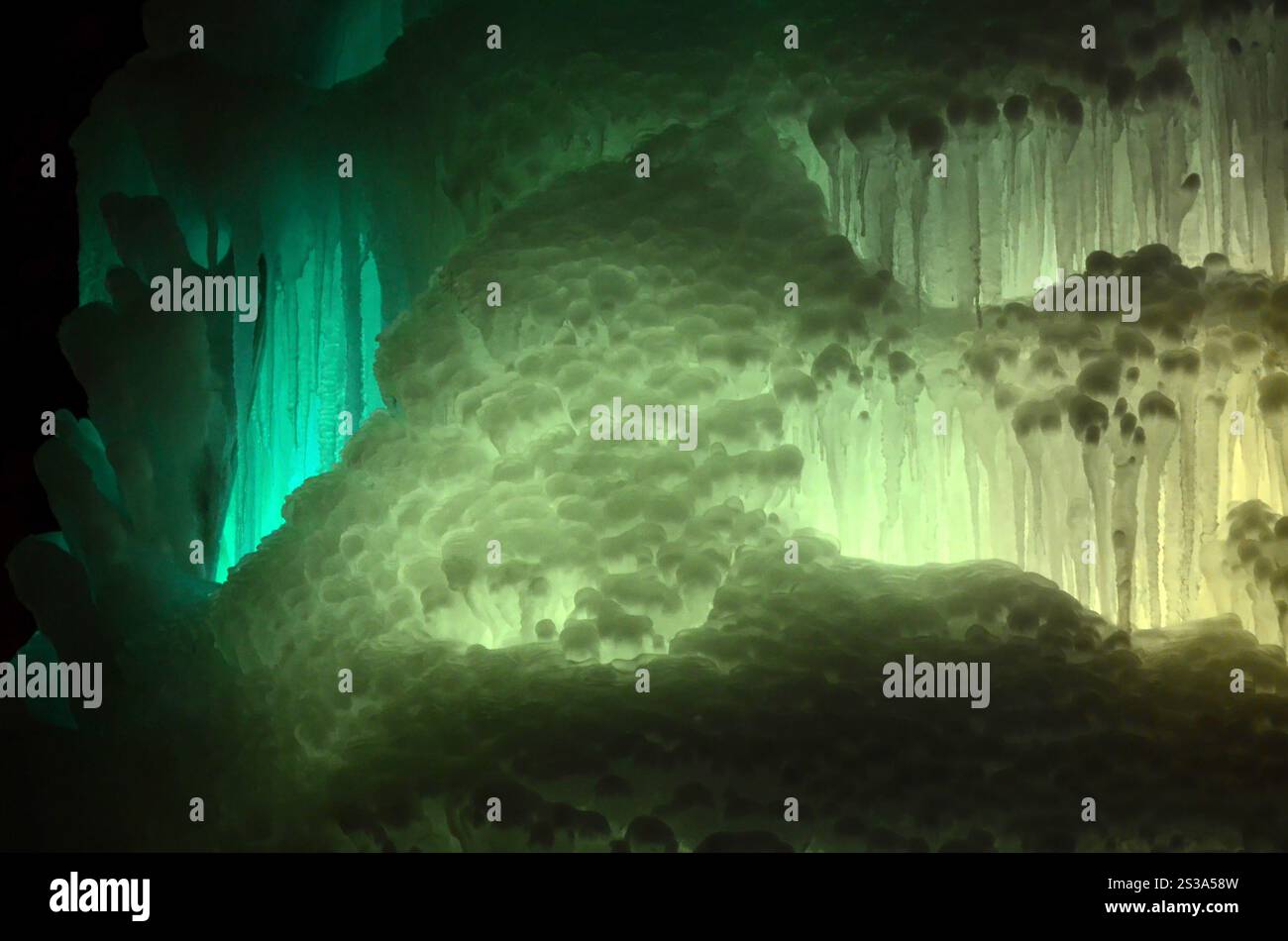 Huge ice icicles. Fragment of large blocks of ice frozen waterfall of ...
