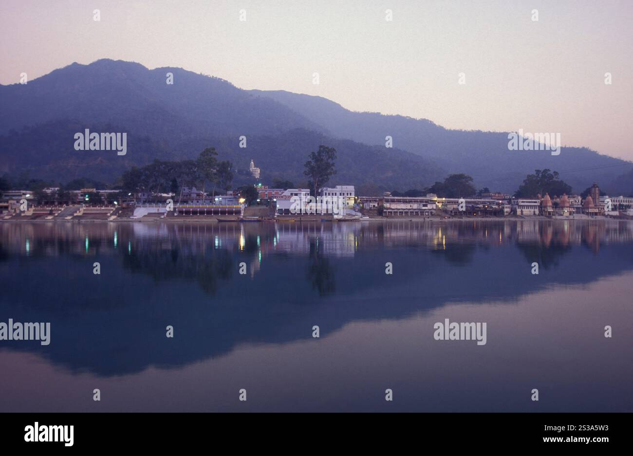 the Holy Ganges River with the city of Rishikesh in the Province ...