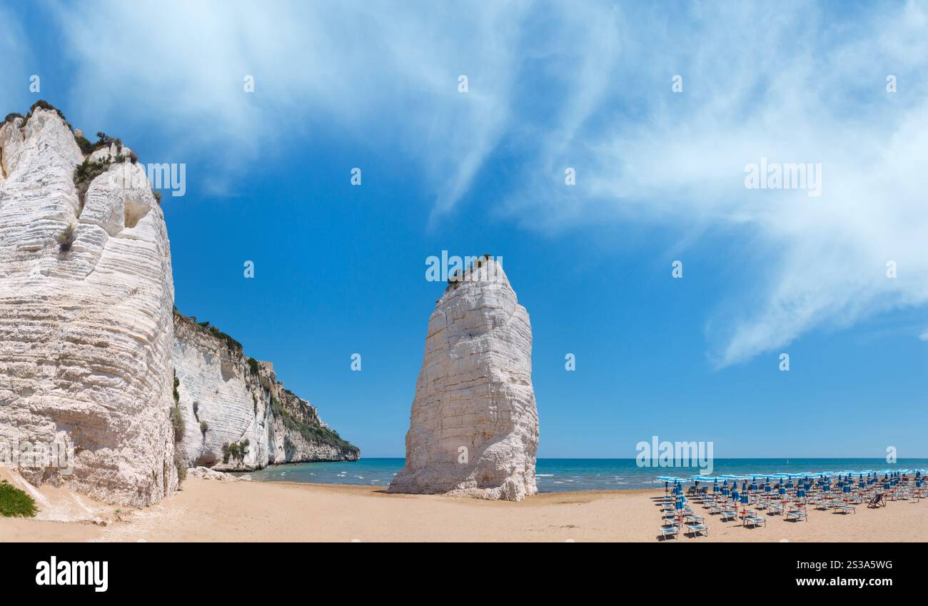Summer picturesque Beach of Pizzomunno with famous white rock, in ...