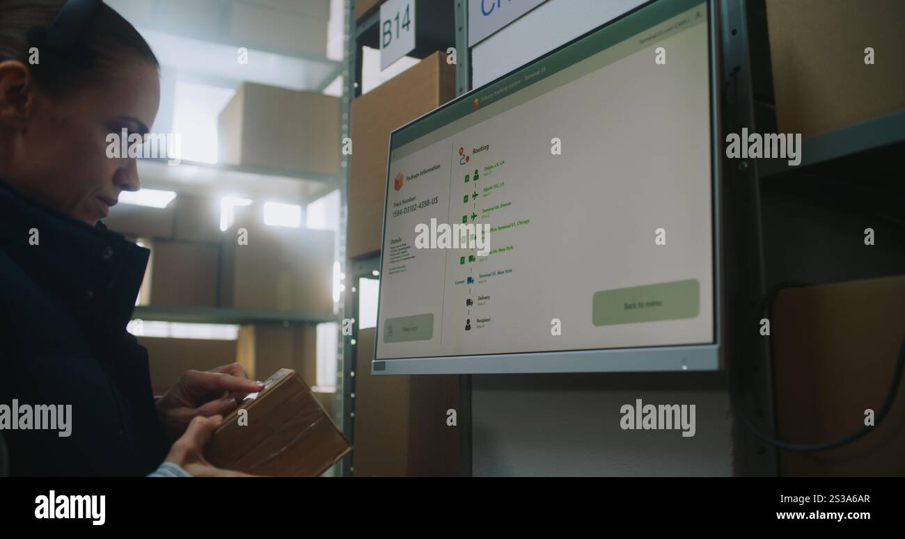 Female Logistics Manager Scans Cardboard Box at Postal Terminal with ...