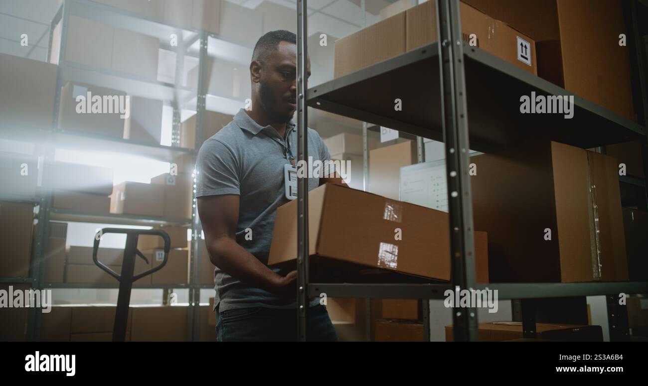 African American Sorting Center Worker Unloads Pallet Truck, Places Cardboard Boxes, Parcels on ...