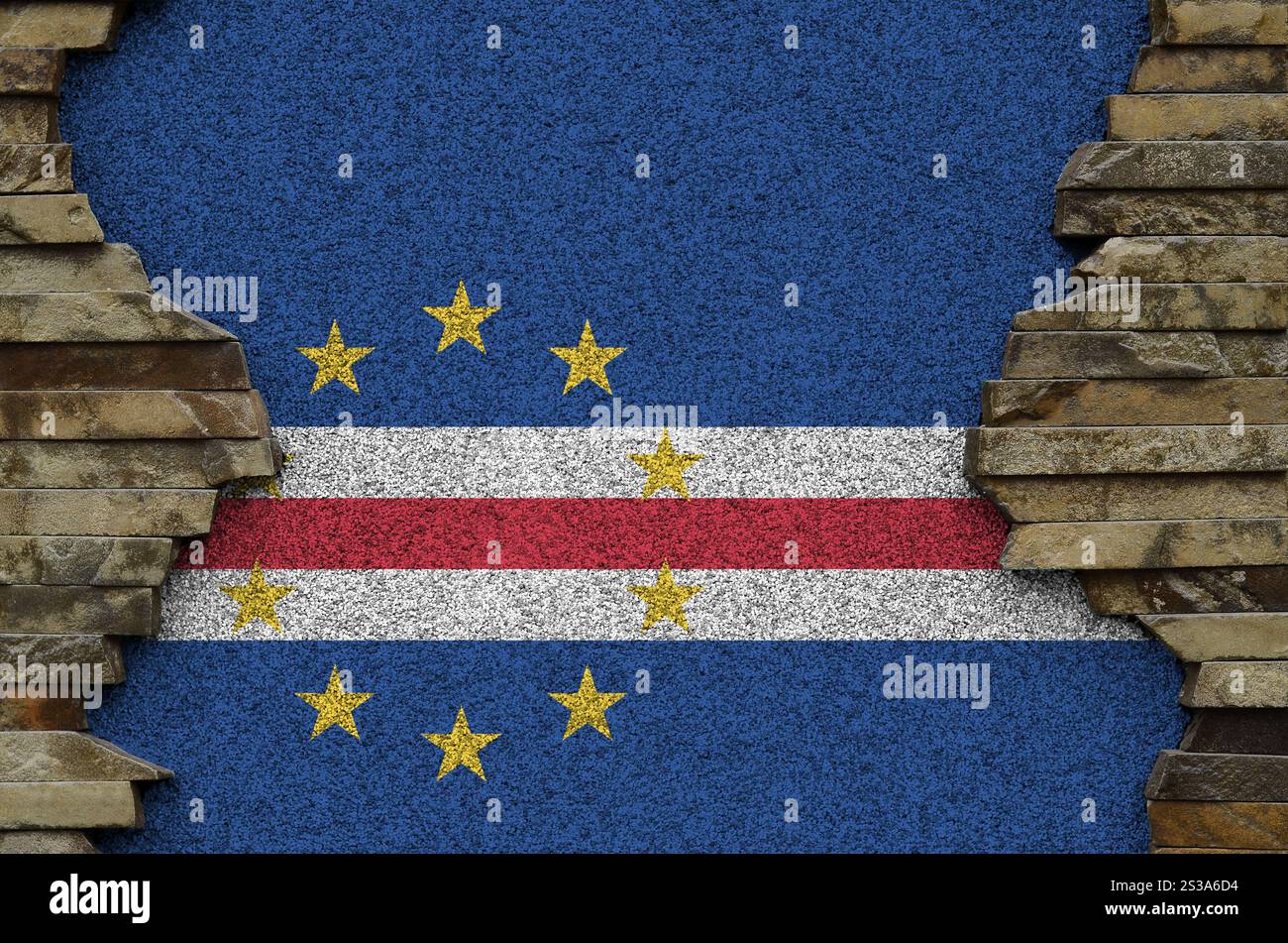 Cabo verde flag depicted in paint colors on old stone wall close up ...