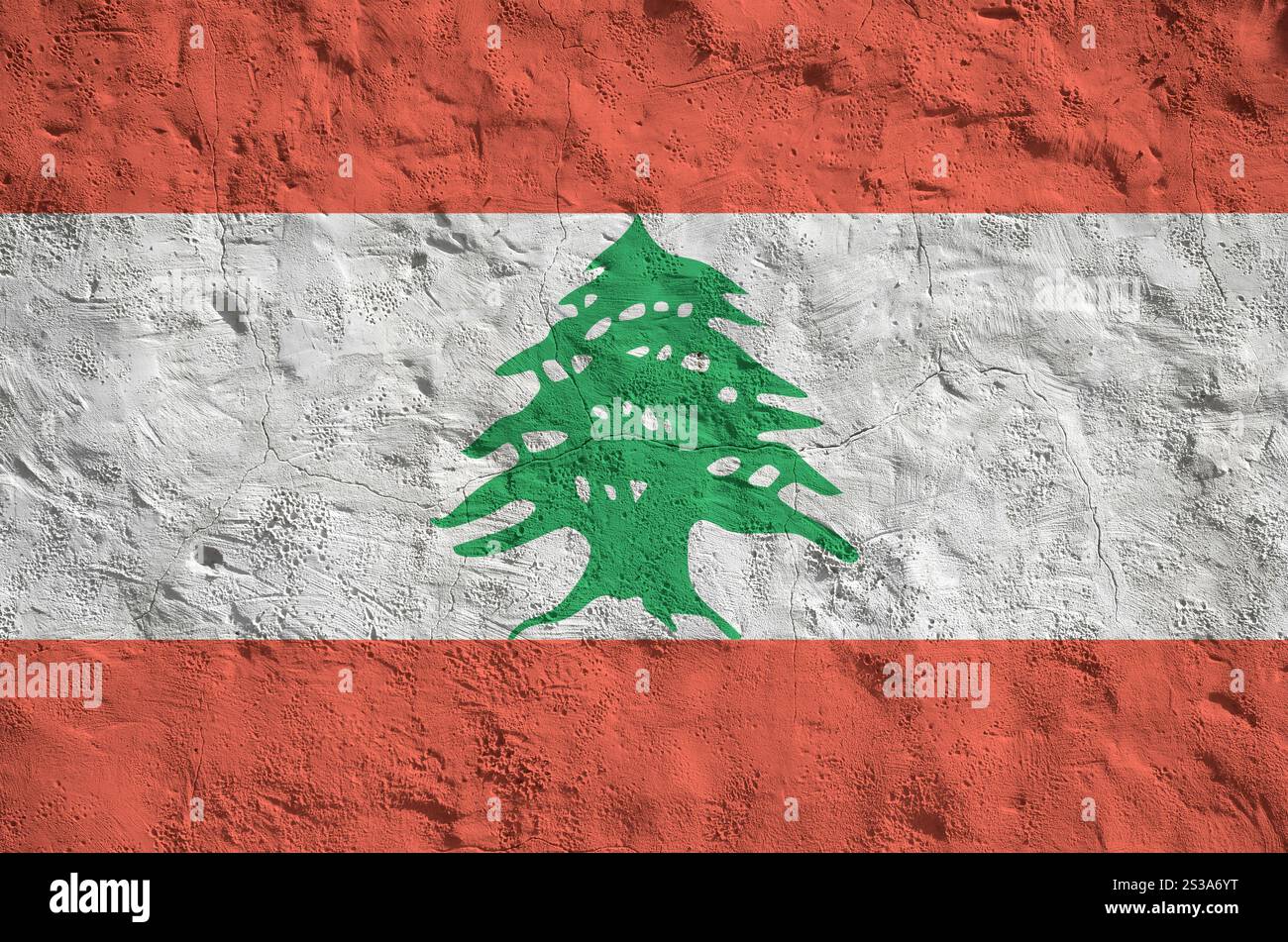 Lebanon flag depicted in bright paint colors on old relief plastering ...