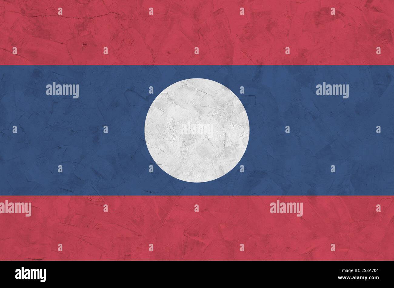 Laos flag depicted in bright paint colors on old relief plastering wall ...
