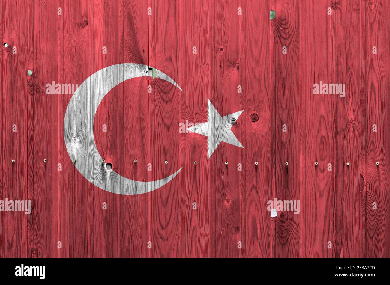 Turkey flag depicted in bright paint colors on old wooden wall close up ...