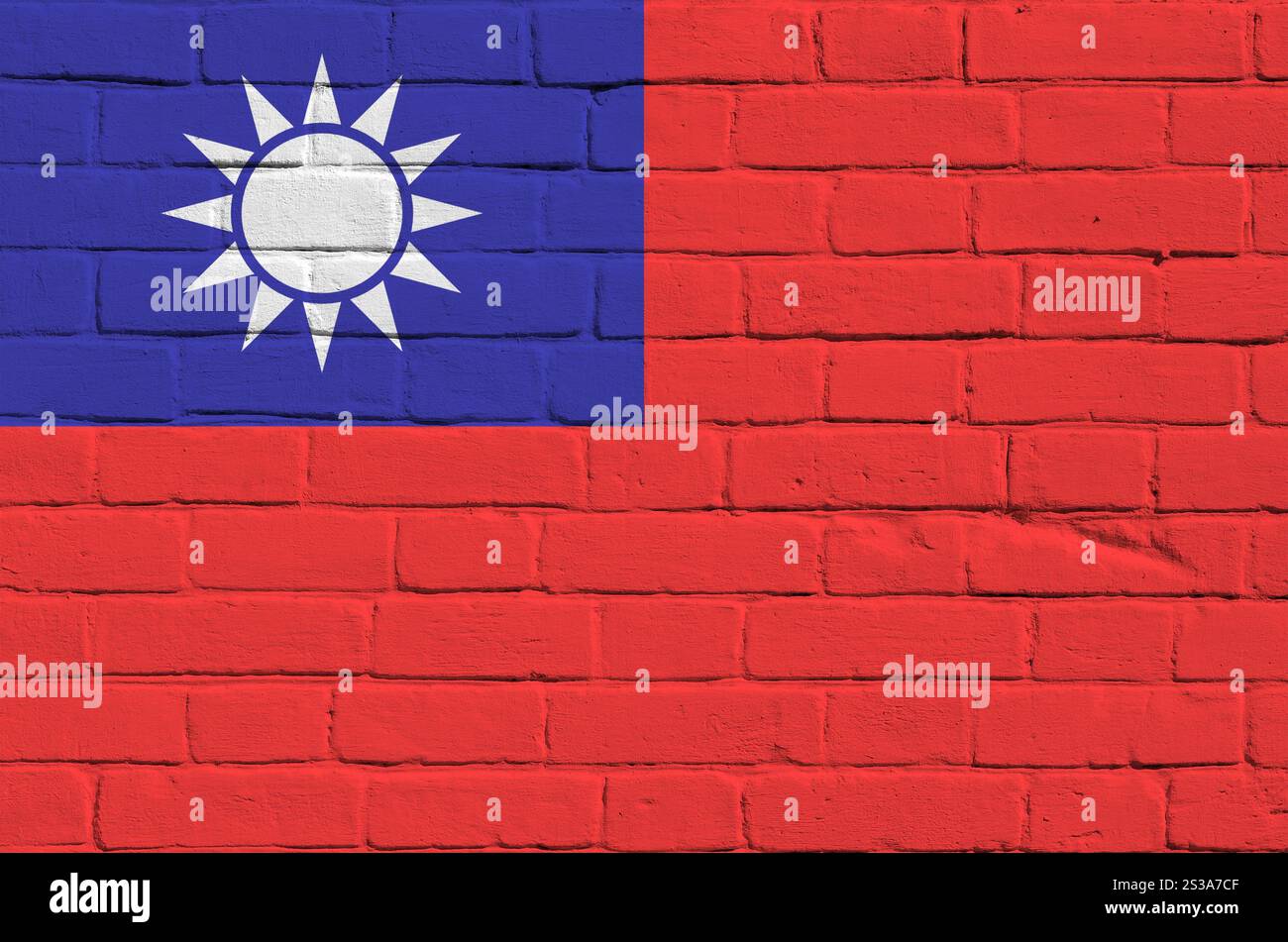 Taiwan flag depicted in paint colors on old brick wall close up ...