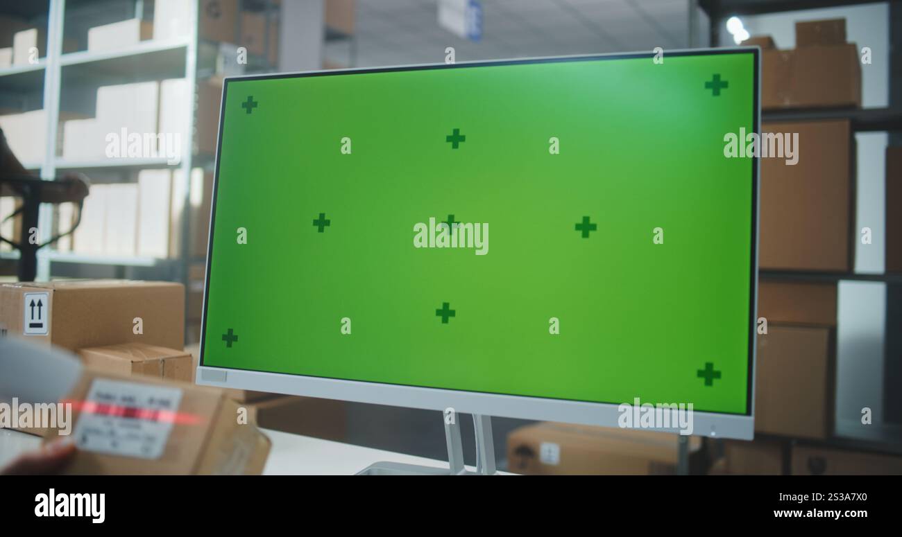 Female Warehouse Associate Scans Code on Cardboard Box with Scanner ...