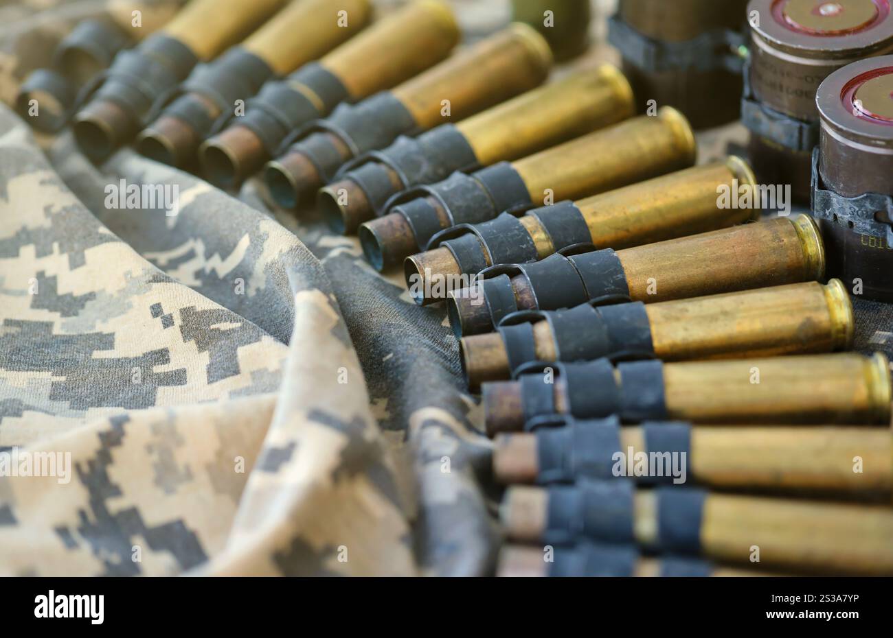 Ukrainian army fabric and machine gun belt shells lies on ukrainian ...