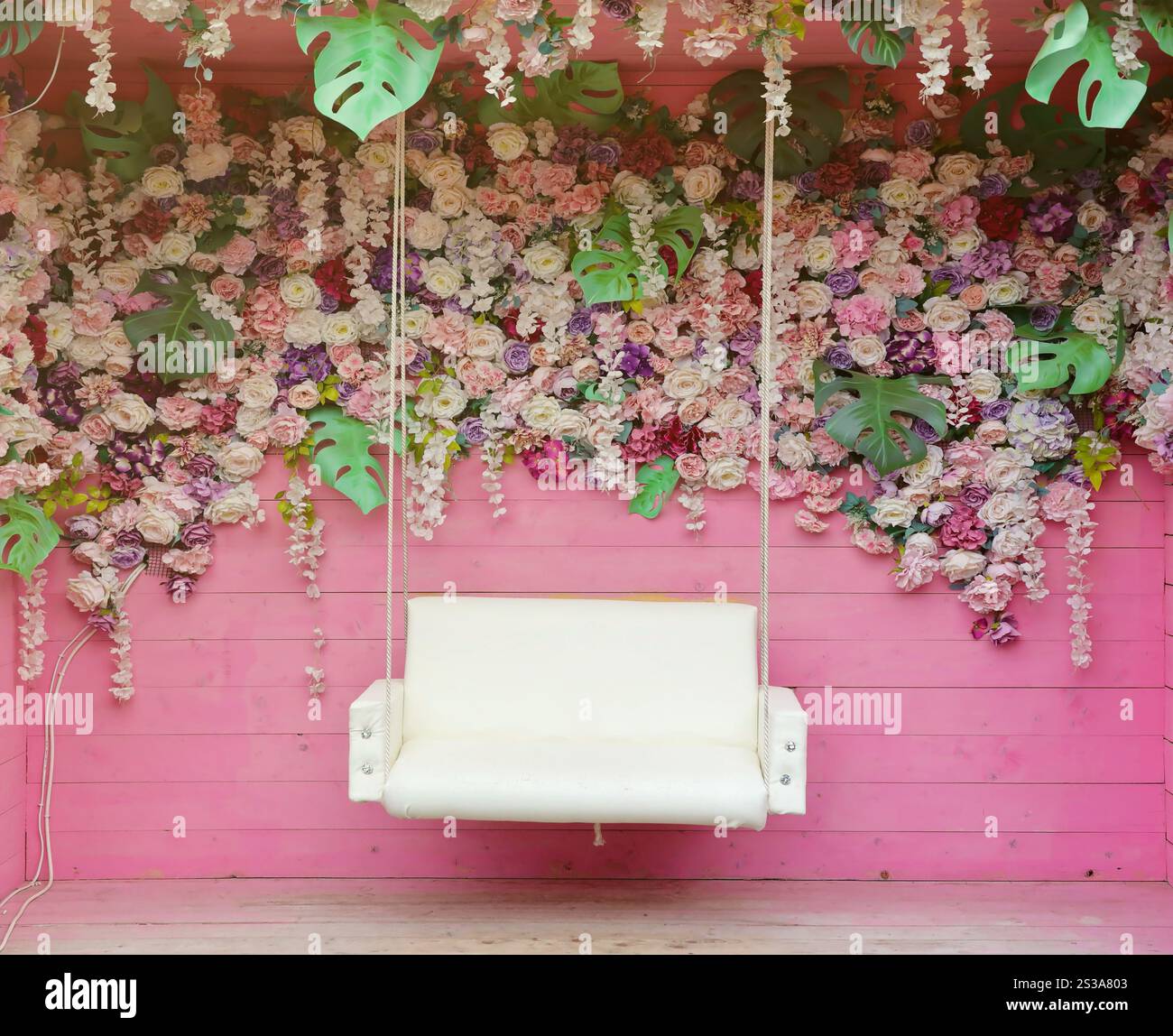 Floral background. Lot of artificial flowers in colorful composition on ...