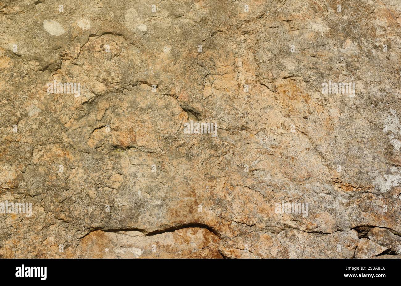 Closeup of the rough stone texture of a big rock surface for natural ...