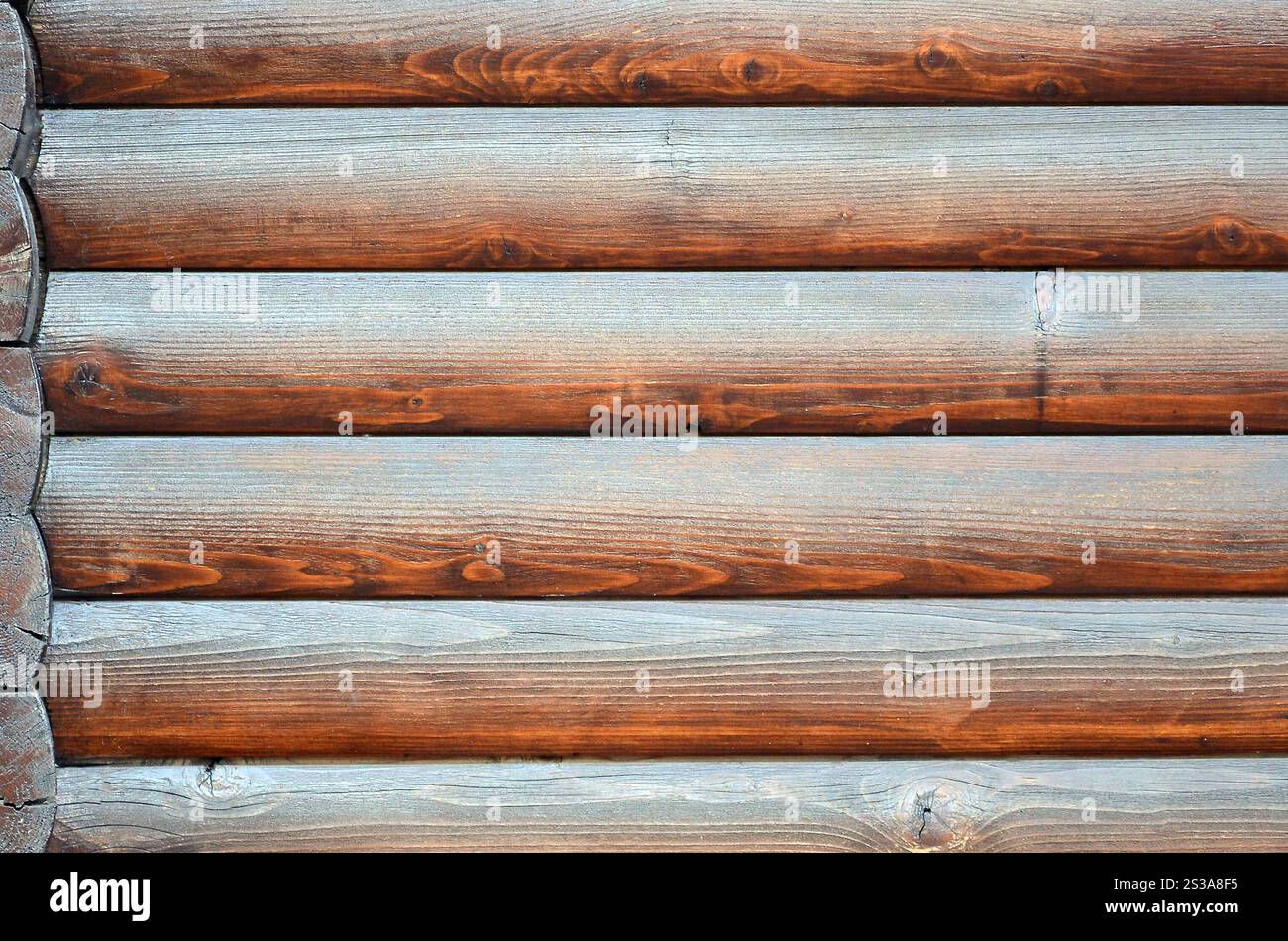 Hewn timber. Rustic log wall horizontal timber background. Fragment of ...