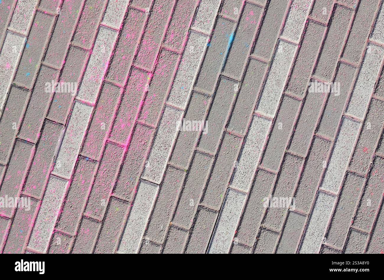 Multi colored earth, paving slabs, powder coated with dry colors at the ...