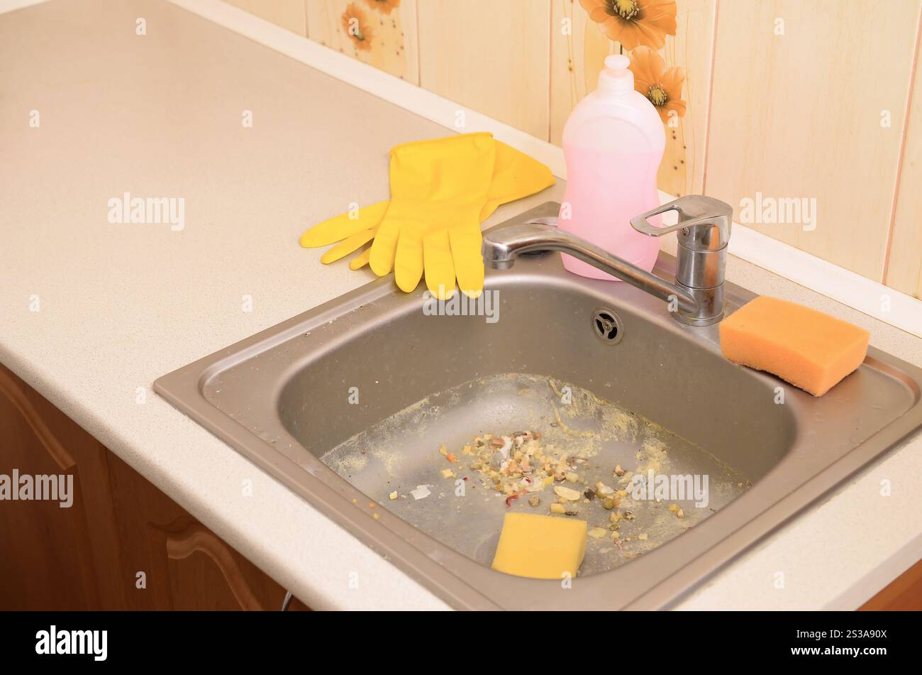 Close up on dirty clogging kitchen sink drain. Blur and selective focus ...