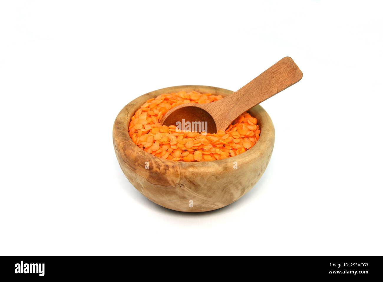 Red lentils in a wooden bowl isolated on white background. Red lentils ...