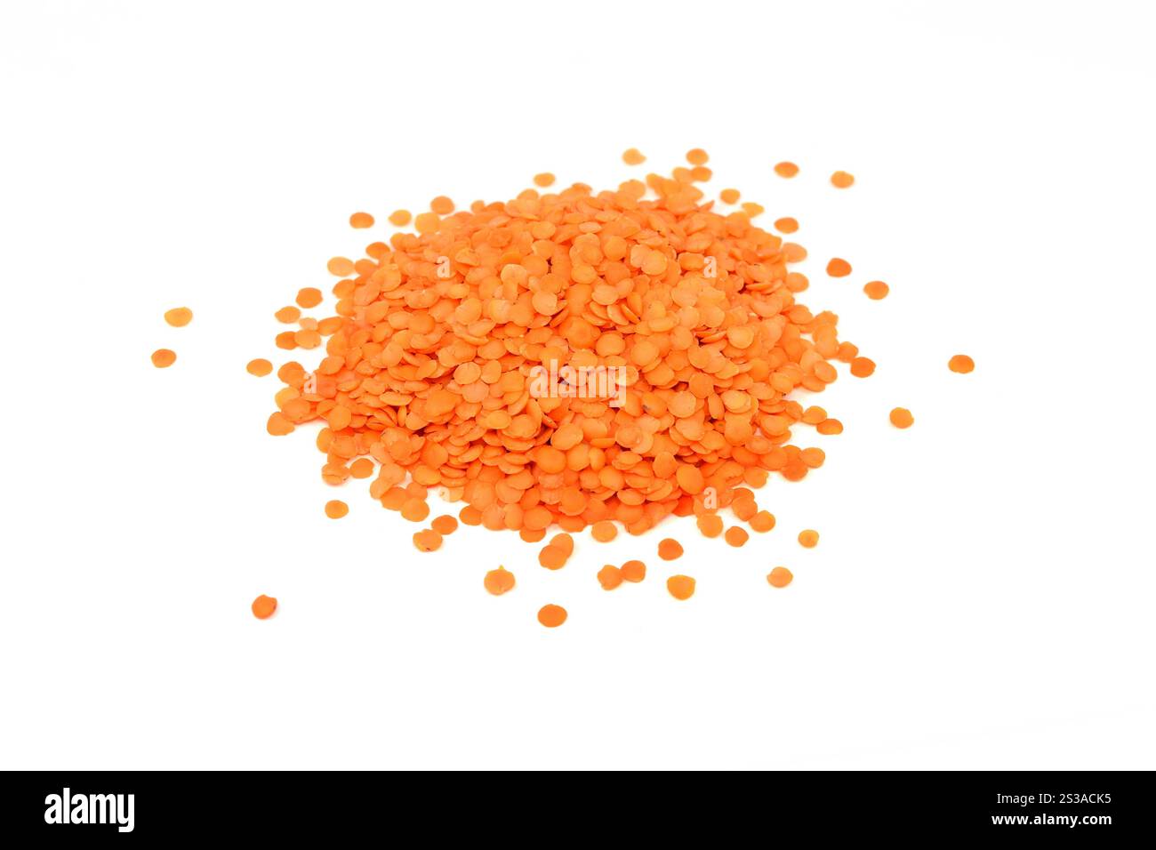 Red lentils isolated on white background. Red lentils pile isolated. Dry orange lentil grains ...