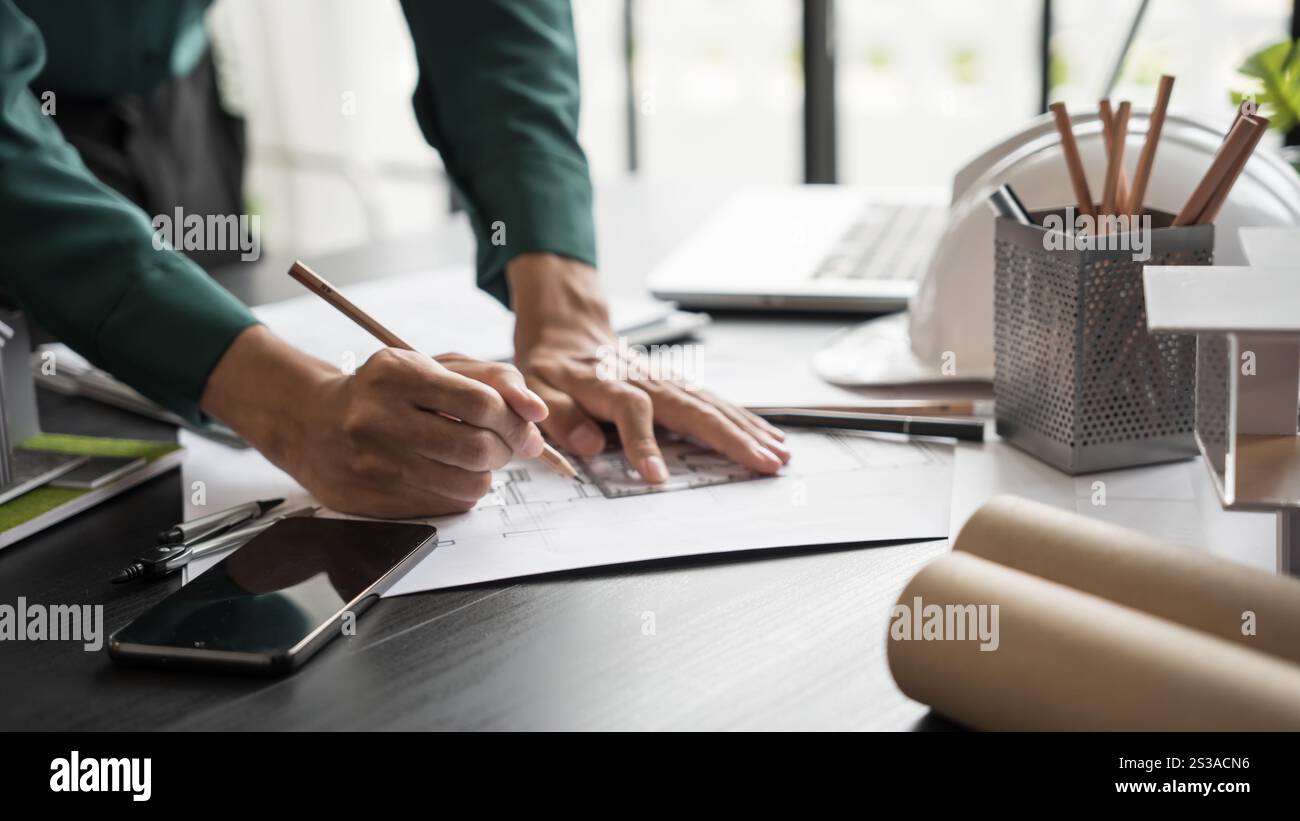 Green Eco Architecture Man drawing on architectural Creative project ...